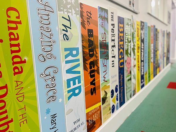 Book spine wall graphic signage for schools - Blocks Design Services