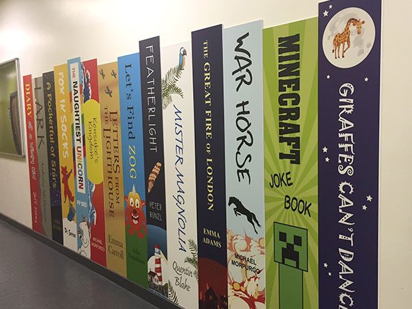 Book spine wall graphic signage for schools - Blocks Design Services